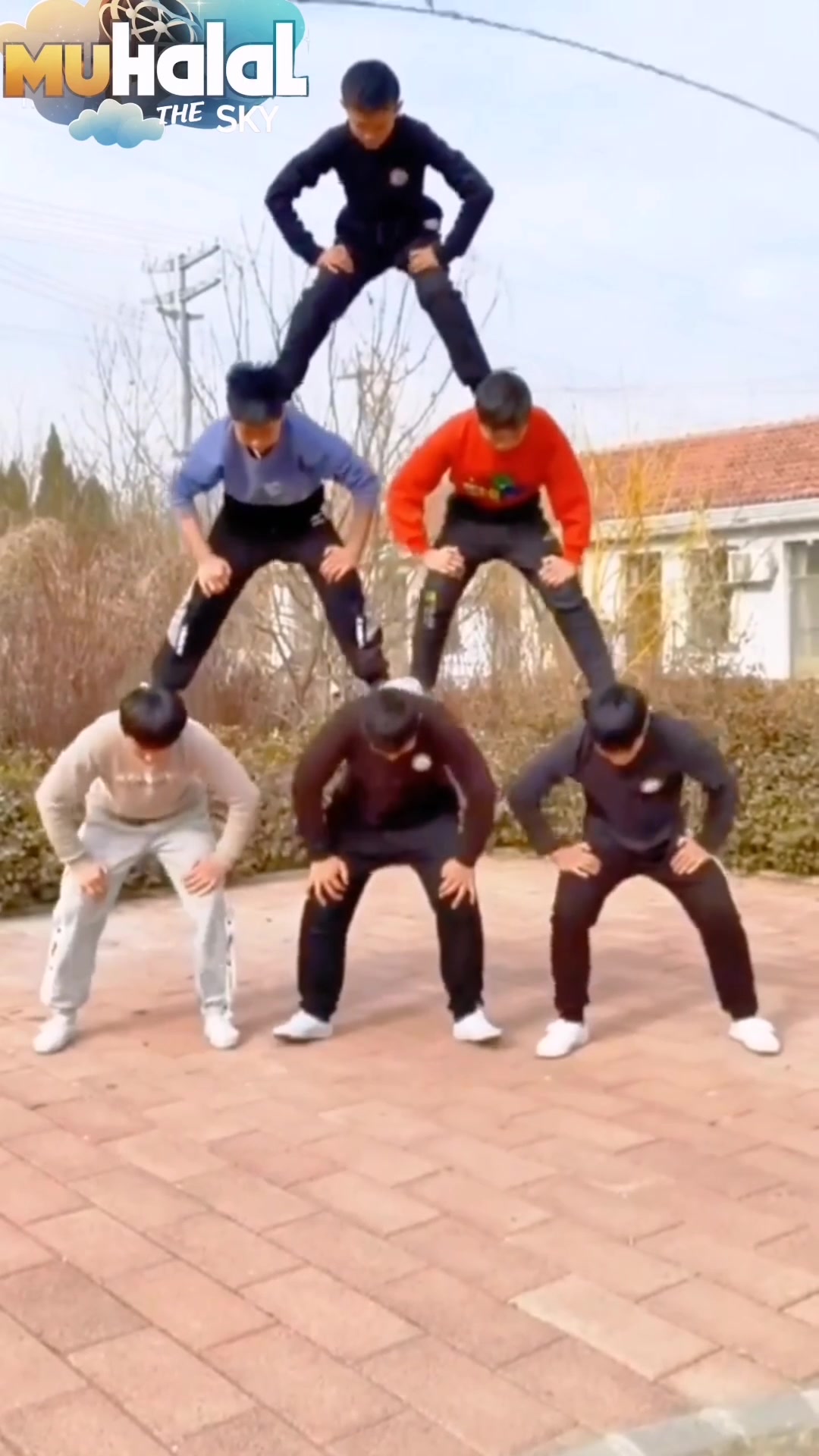 "Human Pyramid Dance: Six People in Perfect Harmony" - Febspot